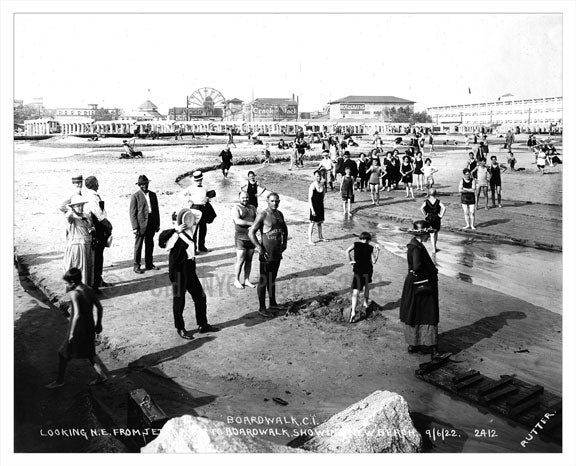1922 - Beach patrons with new boardwalk under construction in the back ...